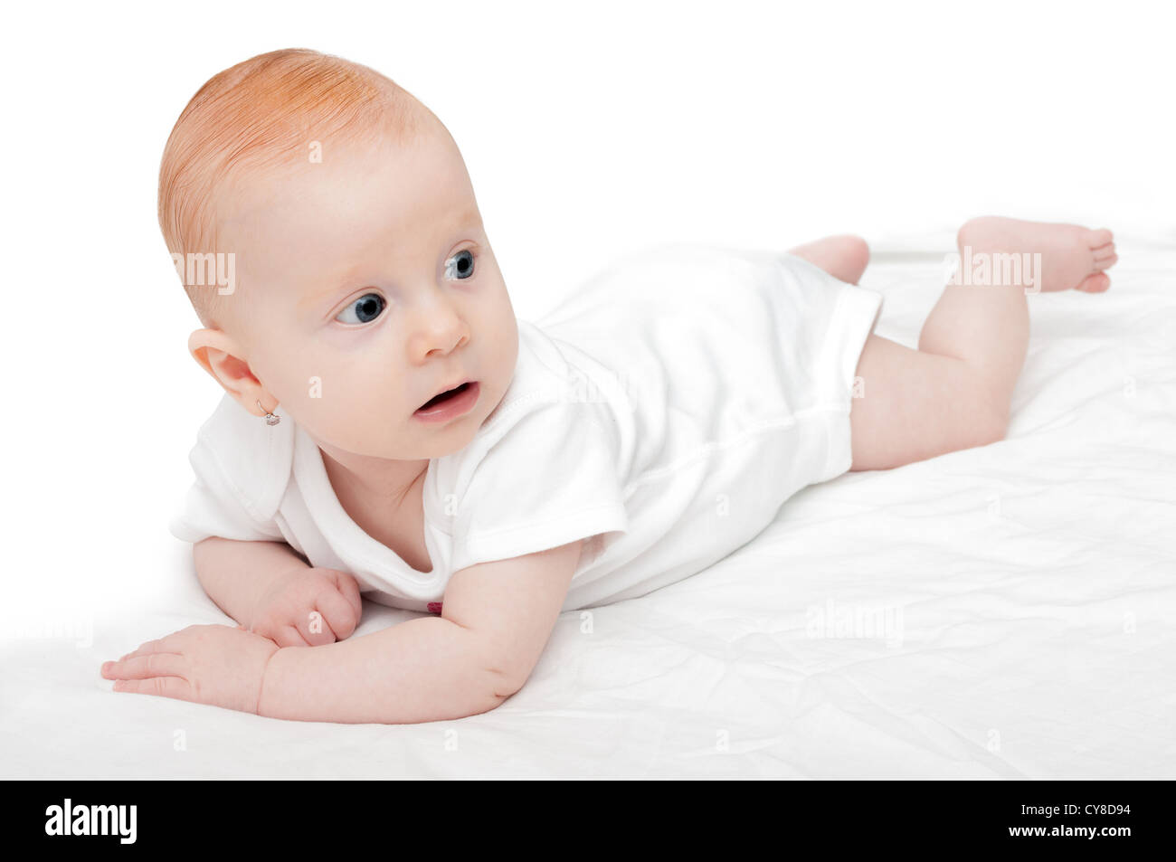Cute Baby Girl Lying on Front on White Background Stock Photo - Alamy