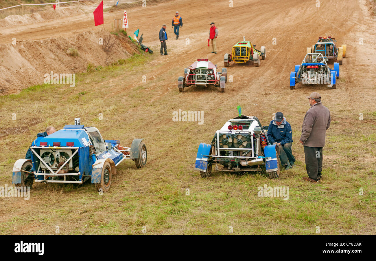 Small buggy test race. Karts on start Stock Photo - Alamy