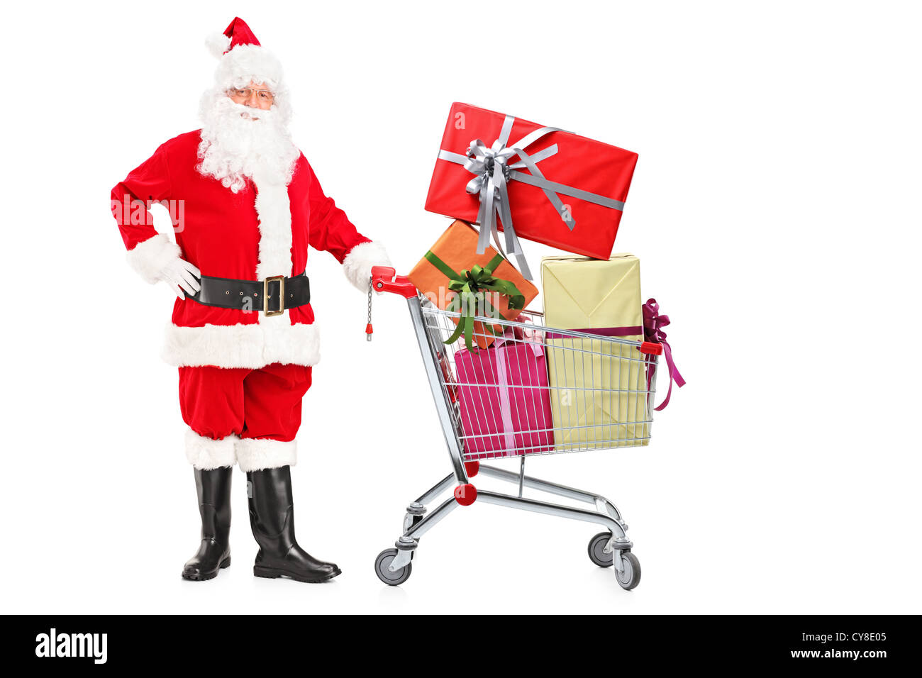 Santa Claus pushing a shopping cart full of gifts isolated on white ...