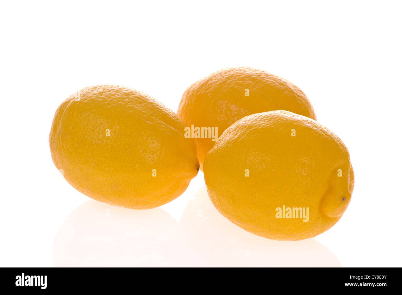 Three whole lemons photographed on a white background Stock Photo - Alamy