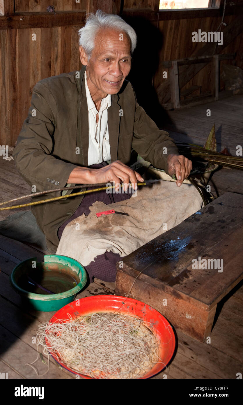 Myanmar, Burma. Man Weaving with Fiber from Lotus Stems, Inle Lake ...