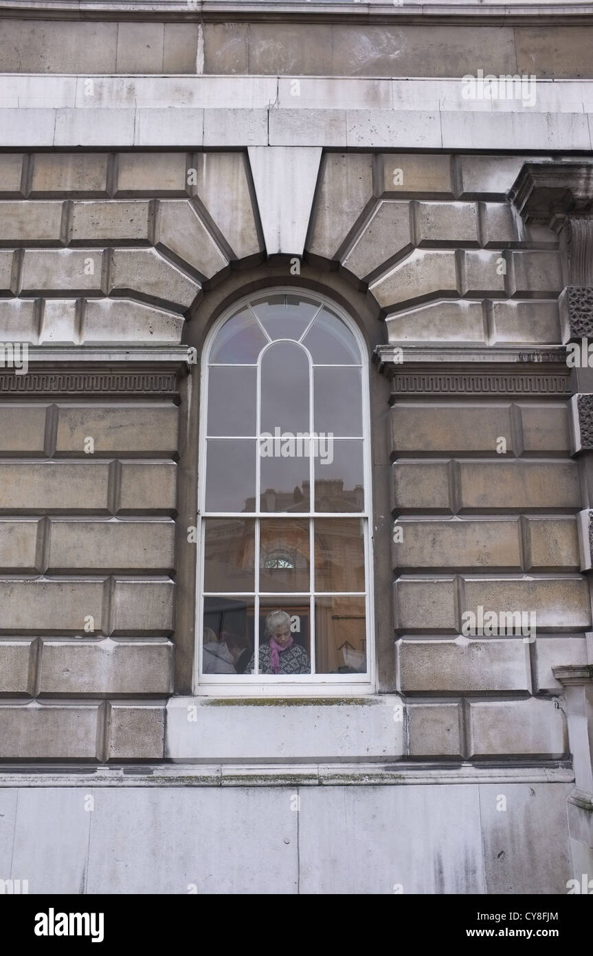 Pretty Blond Women in window at Somerset House Stock Photo - Alamy