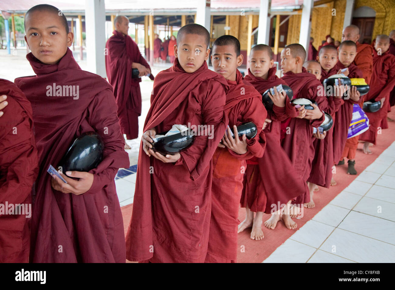 Myanmar, Burma. Buddhist Monks Waiting in Line to Receive Gifts from a ...