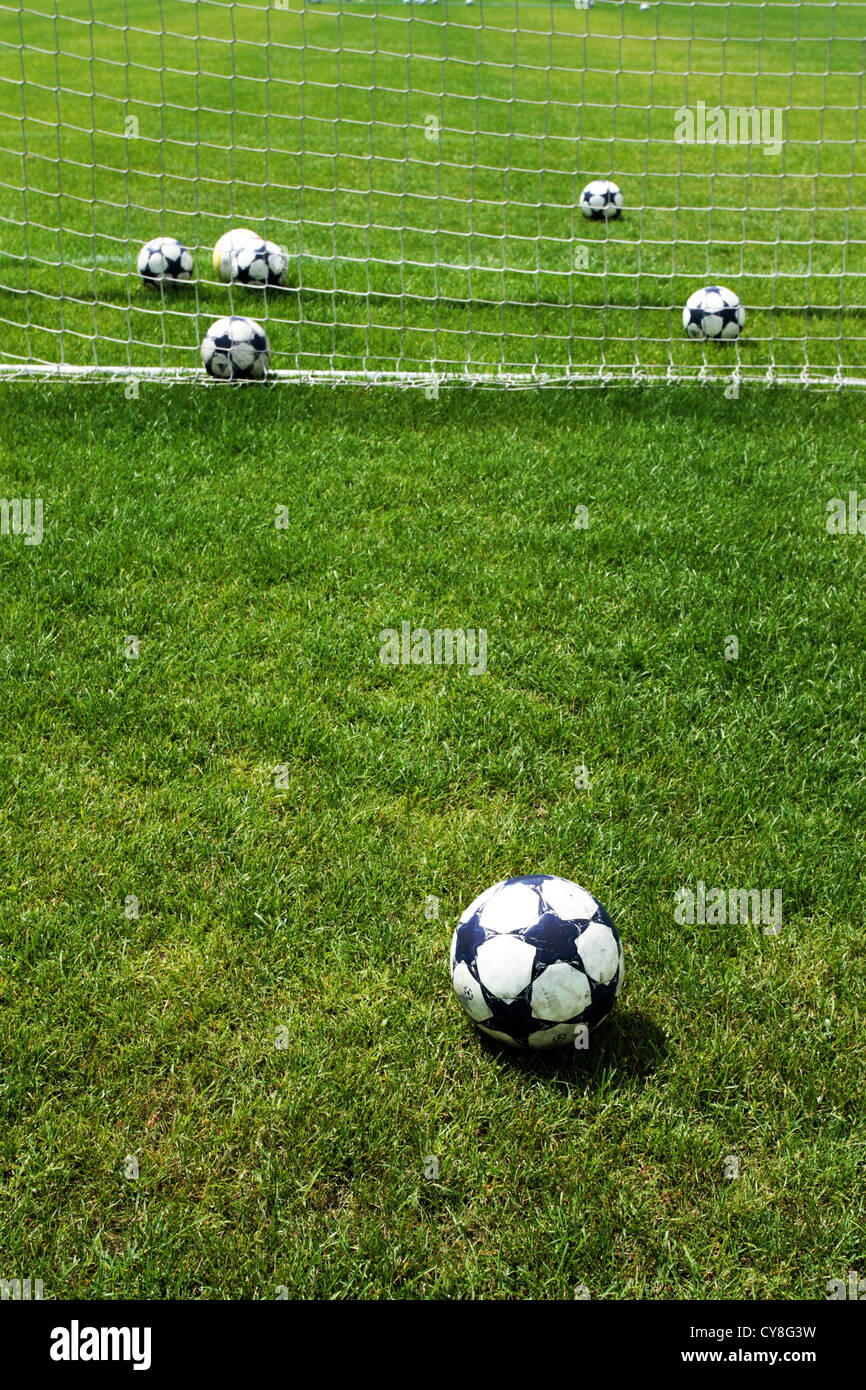 white ball on football soccer turf field green grass background Stock ...