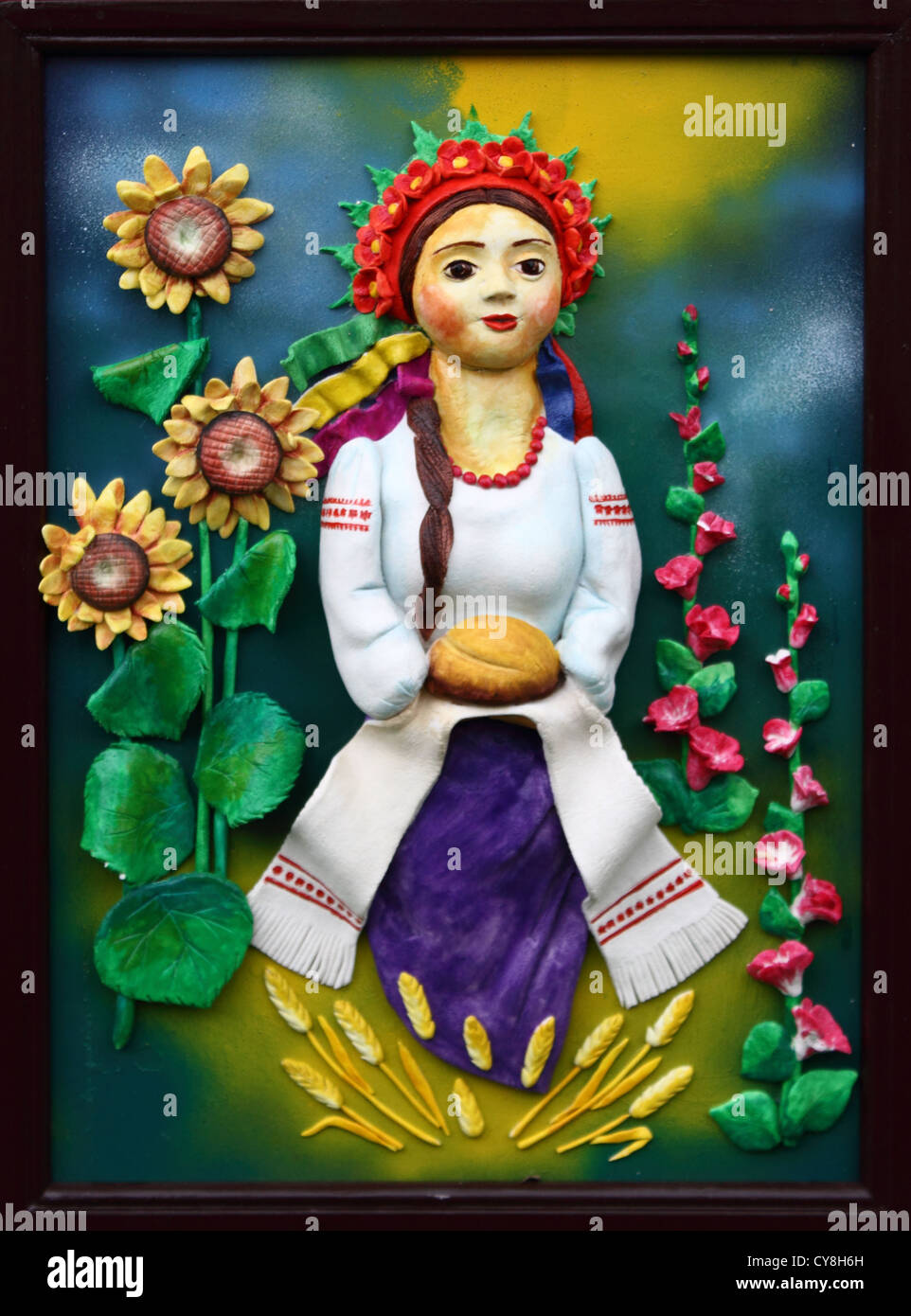 ceramics - Ukrainian girl with a loaf Stock Photo - Alamy