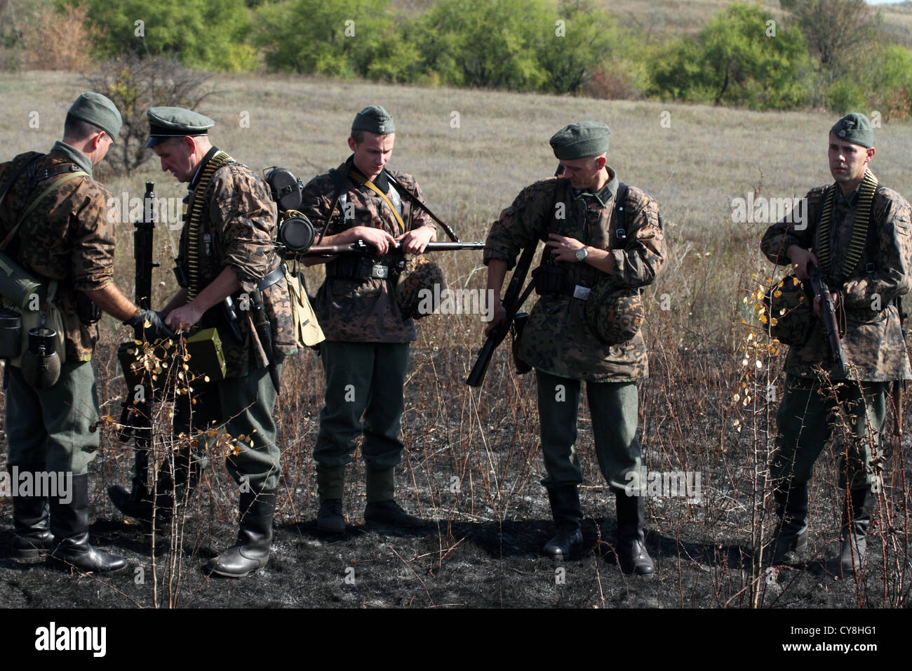 members of Zaporozhye history club "Shield of Fatherland" wears ...