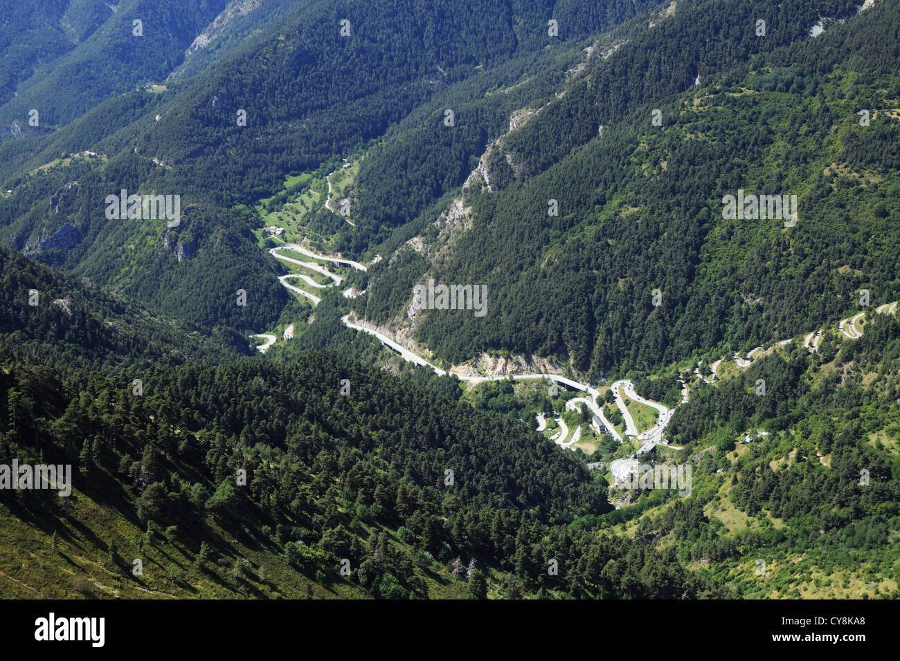 The road with multiple curves leading to the Col de Tende between ...