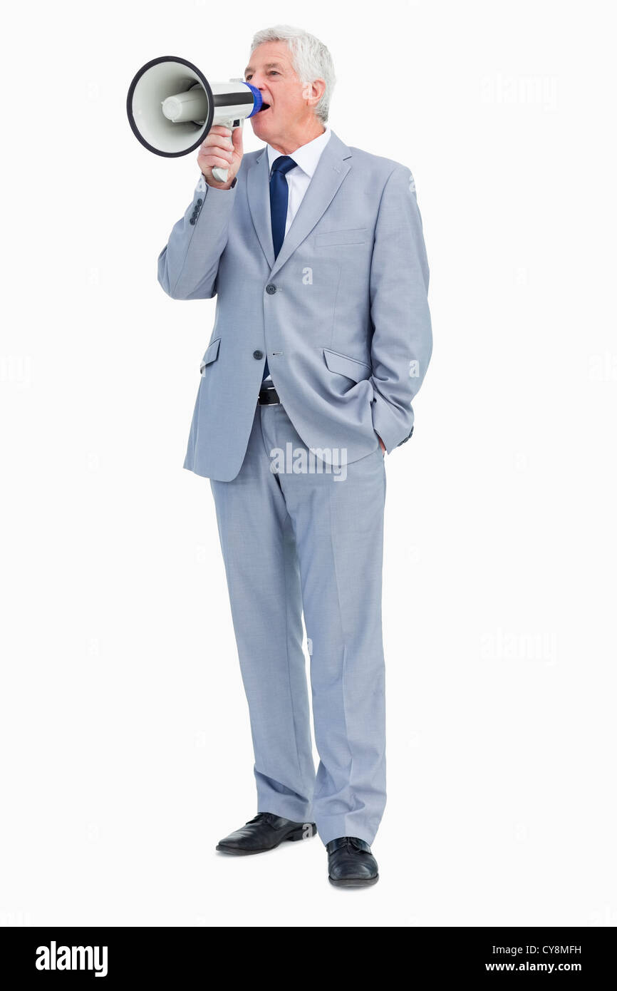 Businessman shouting into a megaphone Stock Photo - Alamy