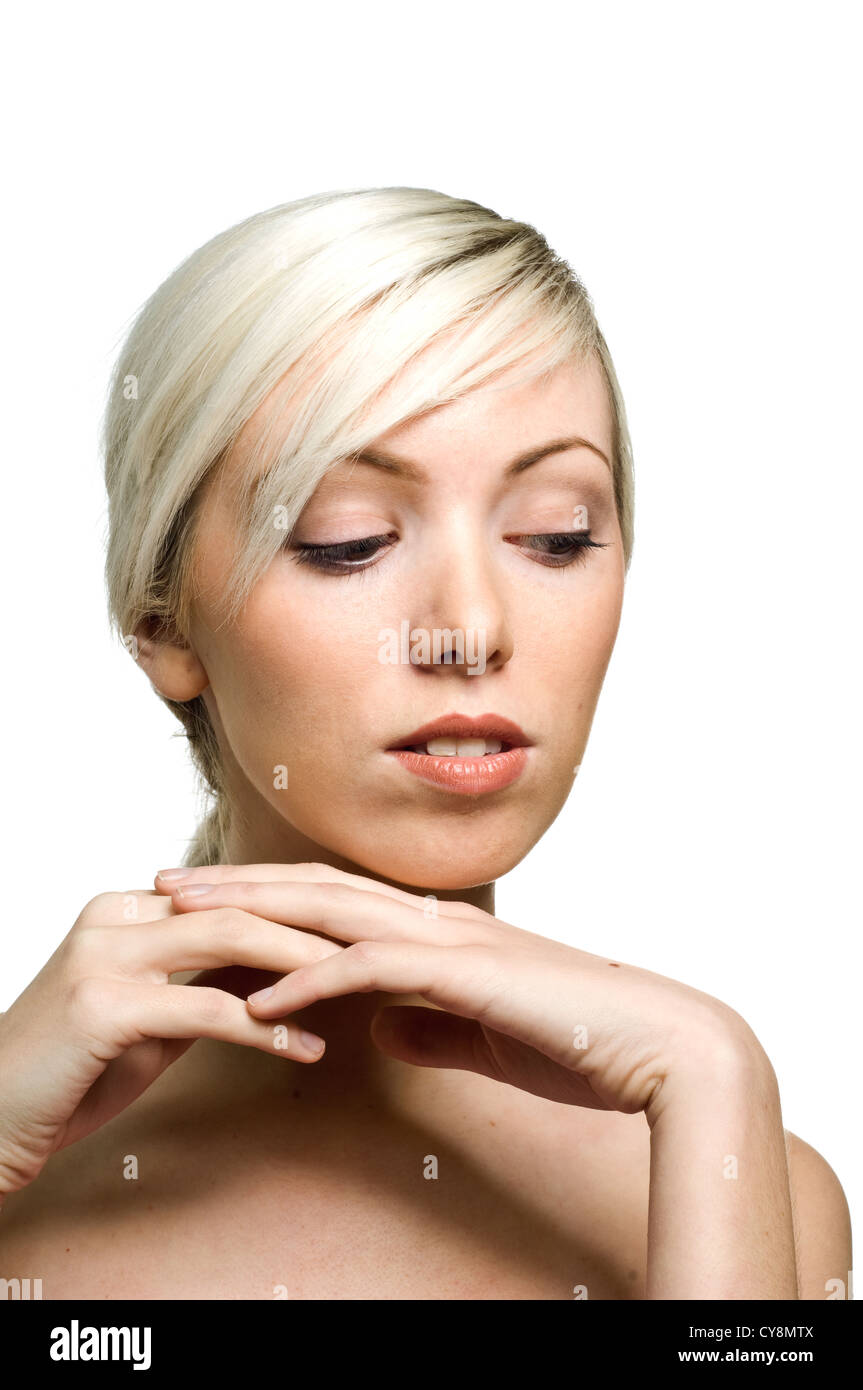 Simple portrait of a beautiful young blonde woman with natural make up ...