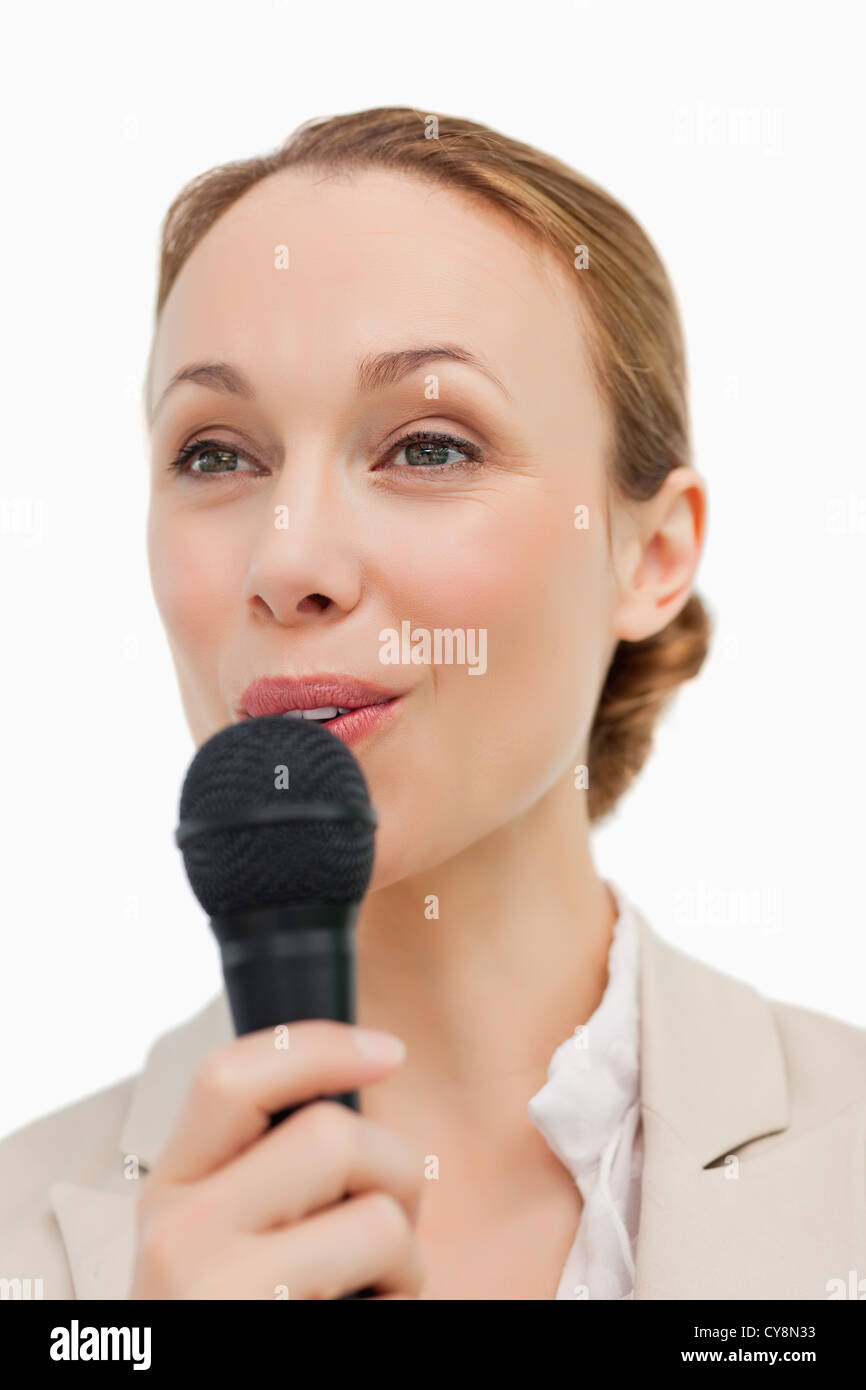 Talking in a microphone hi-res stock photography and images - Alamy