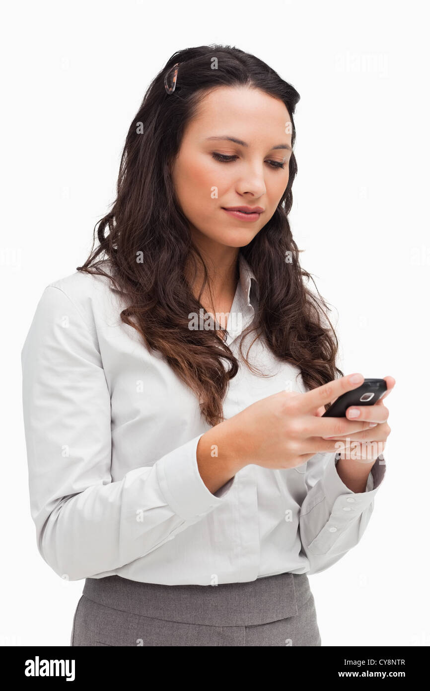 Brunette woman texting Stock Photo - Alamy