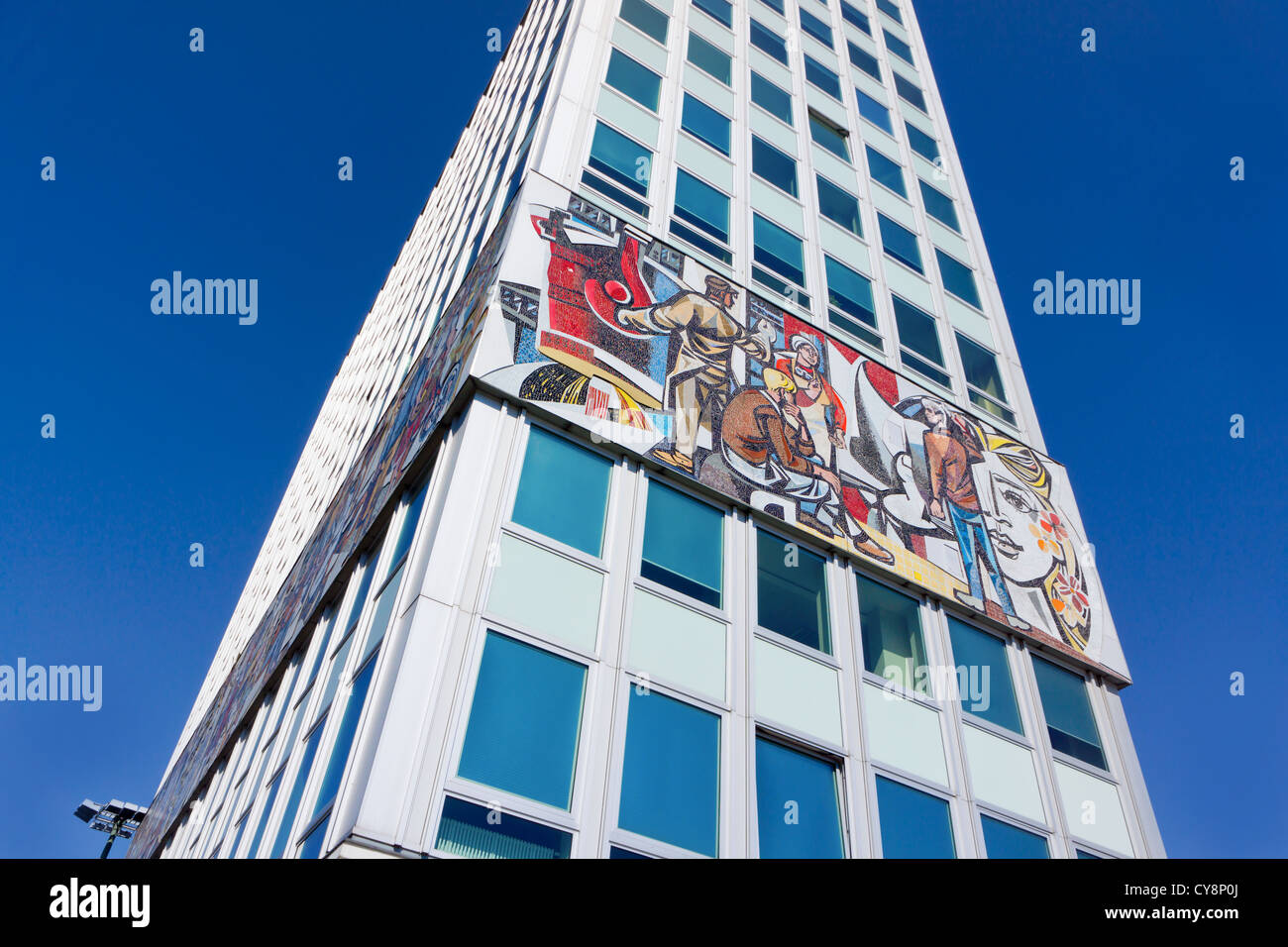 Former GDR (DDR) Socialist Mosaic theme on a building. The House of ...