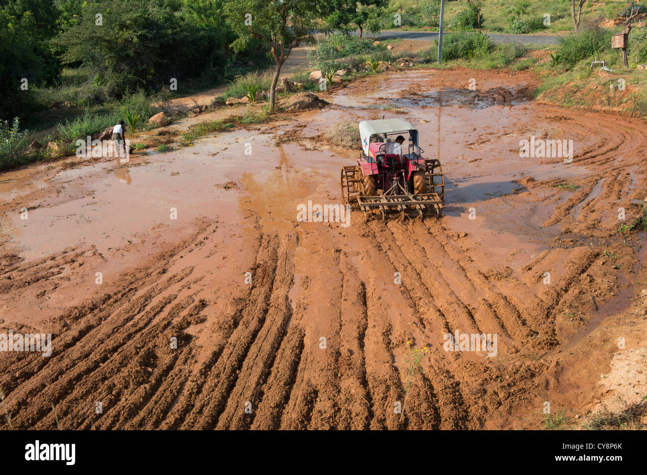 Indian farmer ploughing field tractor hi-res stock photography and ...