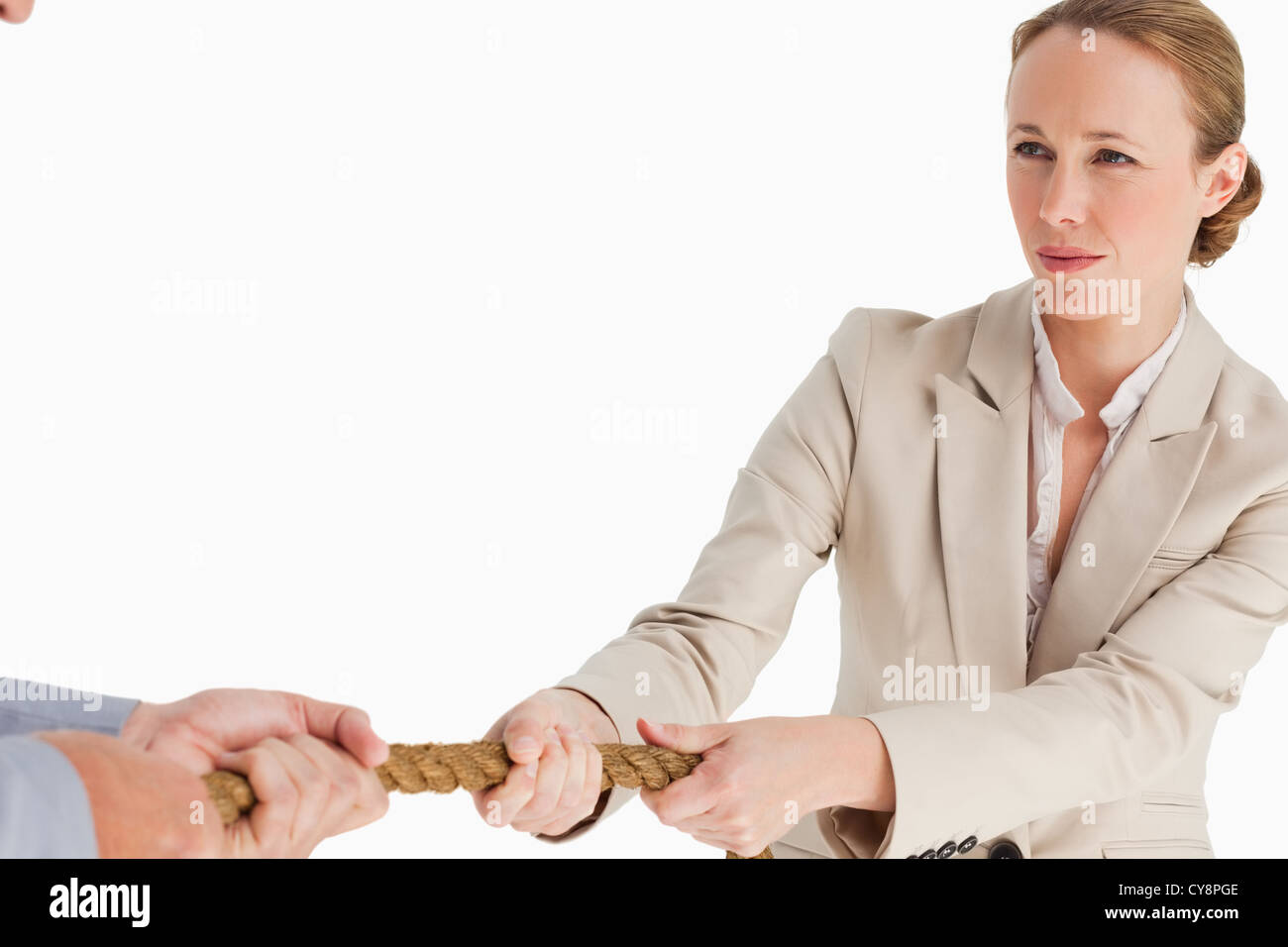 Businesswoman pulling the rope Stock Photo - Alamy