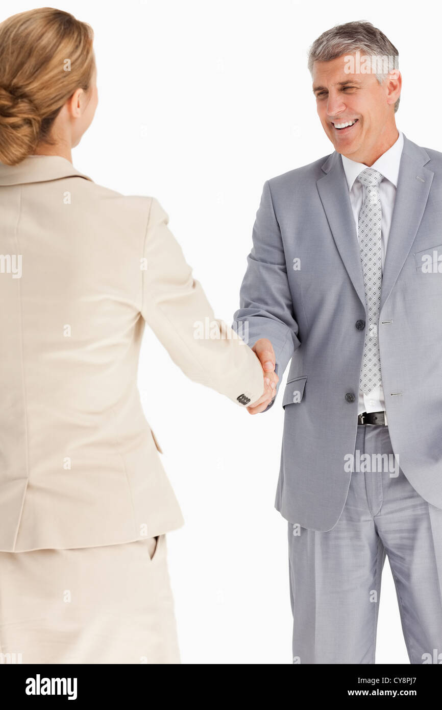 Happy business people shaking hands Stock Photo - Alamy