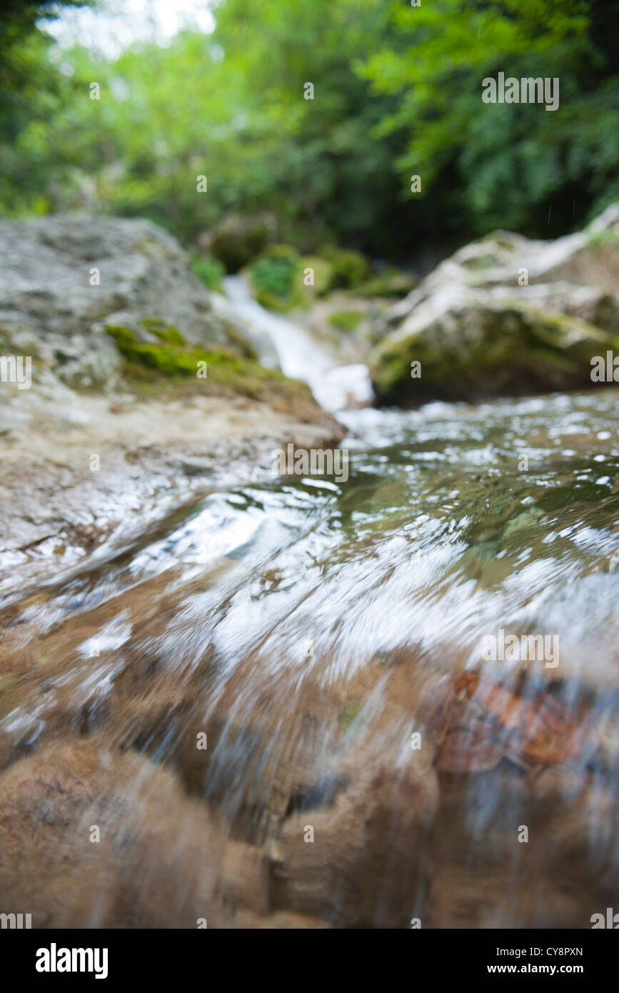 Water flowing over rocks, close-up Stock Photo - Alamy
