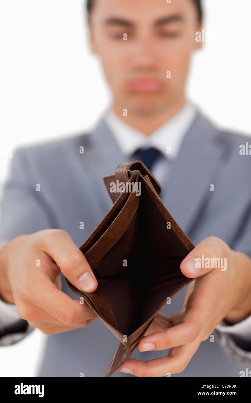 Sad man with a empty wallet Stock Photo - Alamy