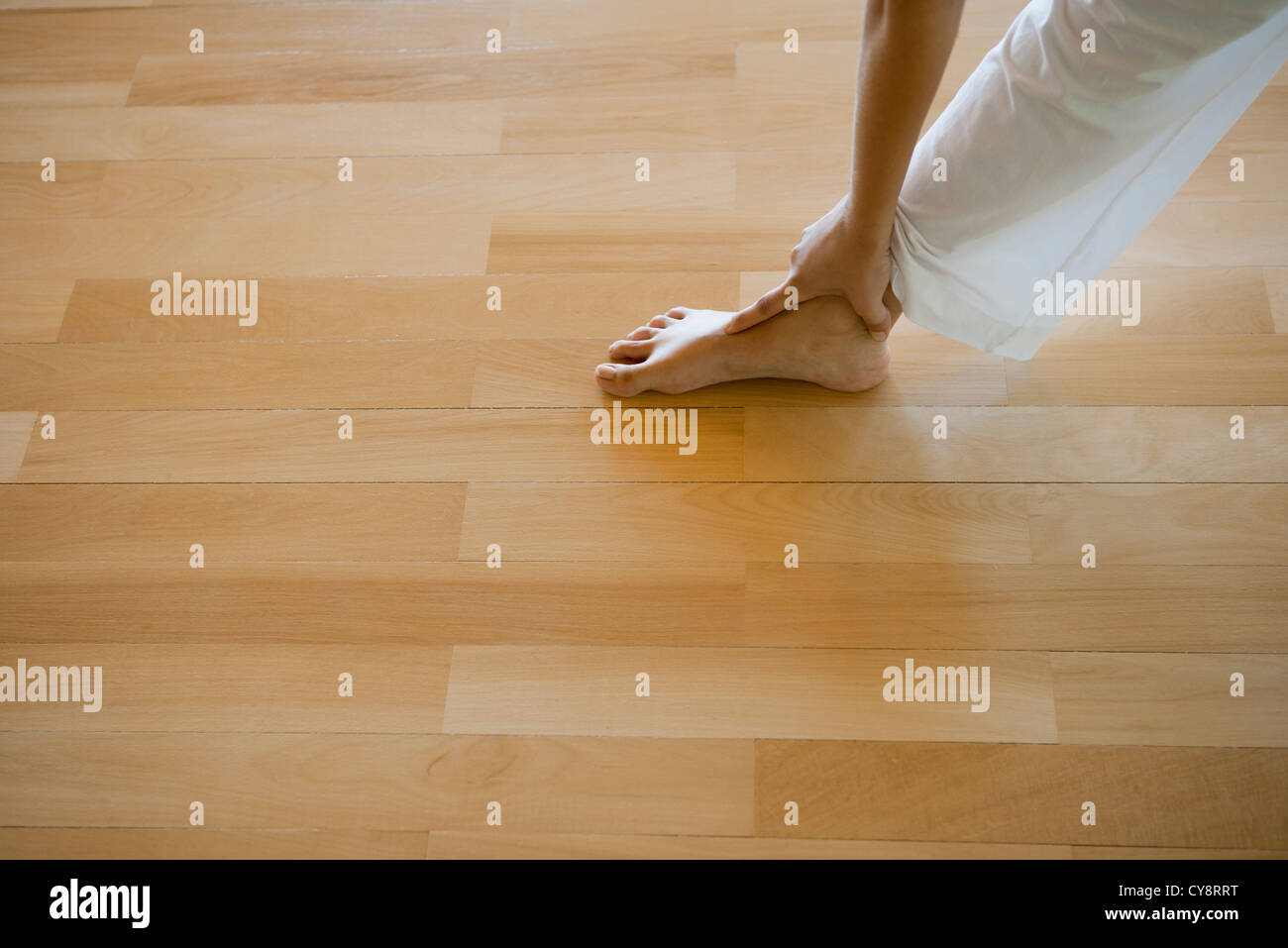 Woman stretching, low section, cropped Stock Photo - Alamy