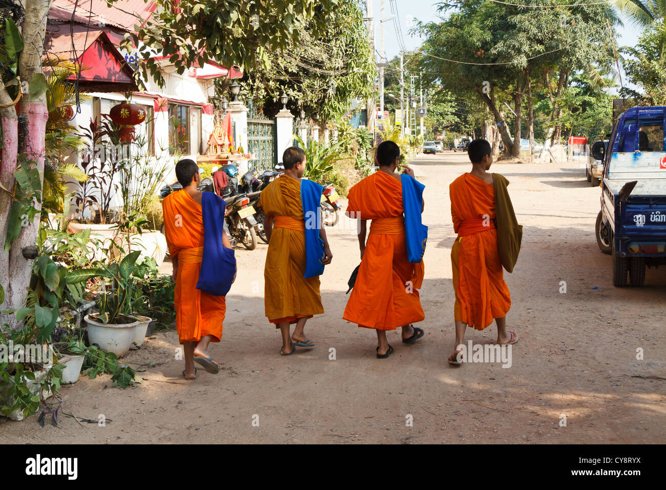 Buddhist Monks walking in the Street in Vientiane, Laos Stock Photo - Alamy