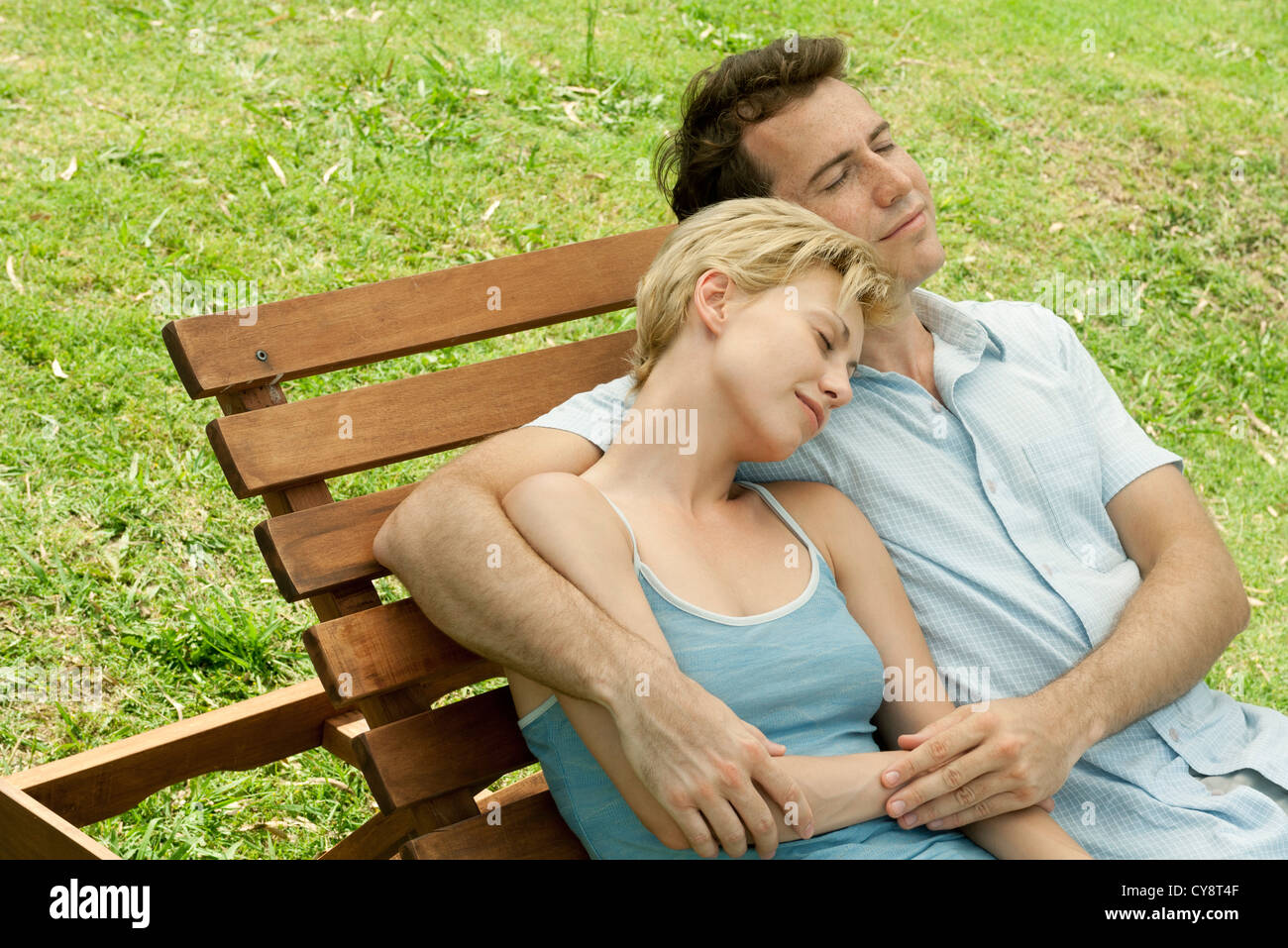 Couple sits on chair hi-res stock photography and images - Alamy