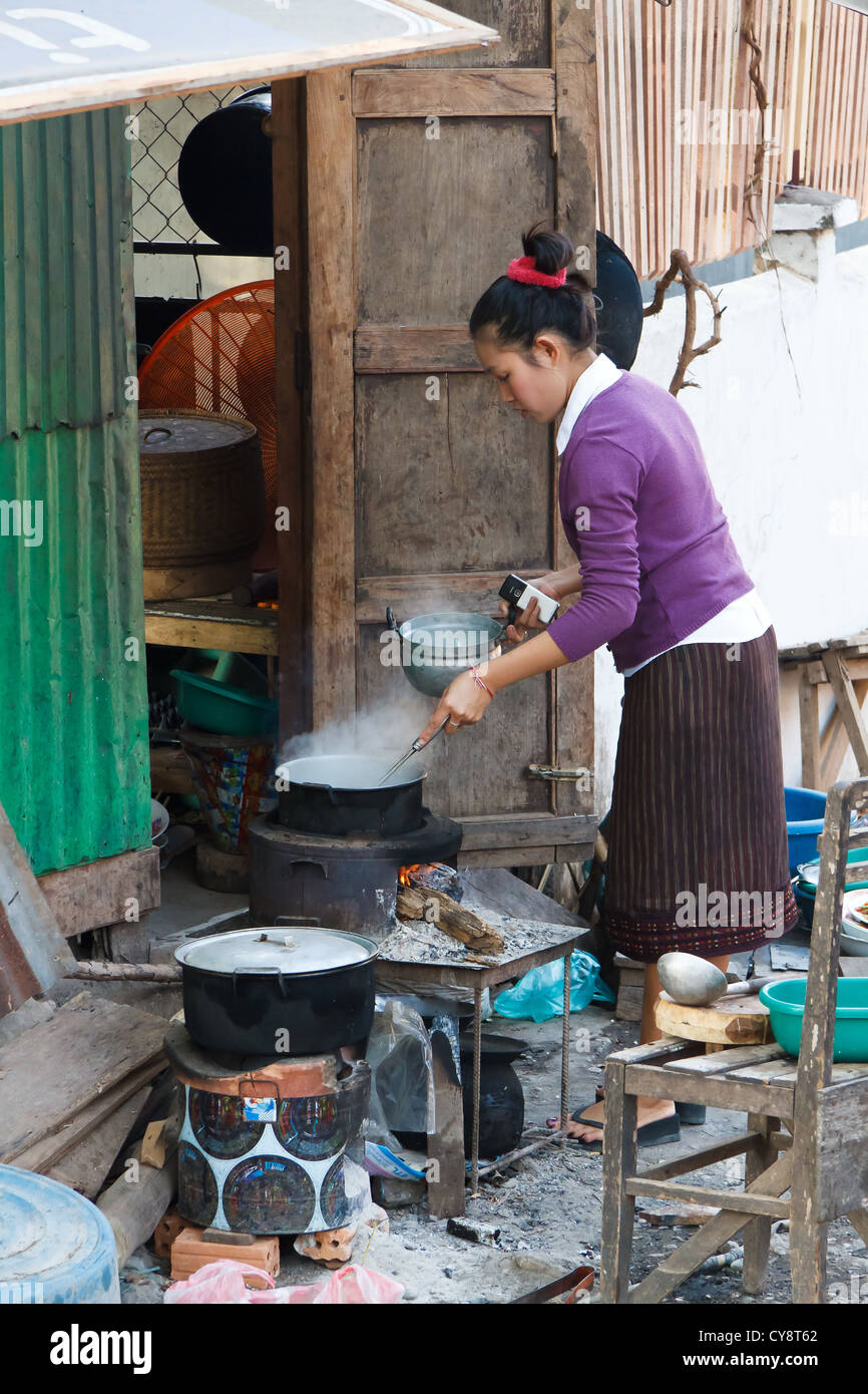 Woman cooking in the Street in Vientiane, Laos Stock Photo - Alamy
