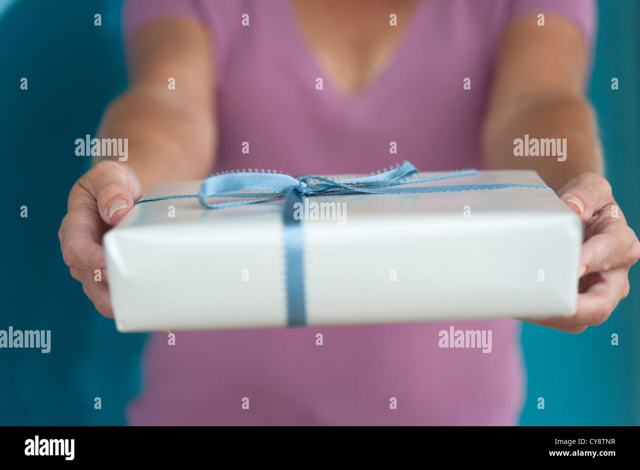 Woman Giving Presents Out High Resolution Stock Photography and Images ...