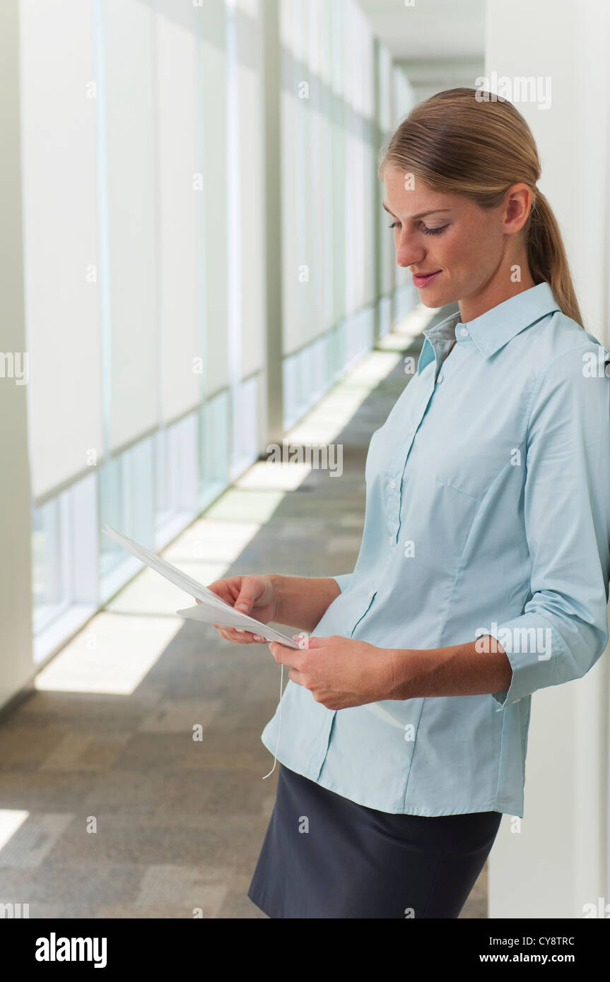 Woman holding folder against hi-res stock photography and images - Alamy