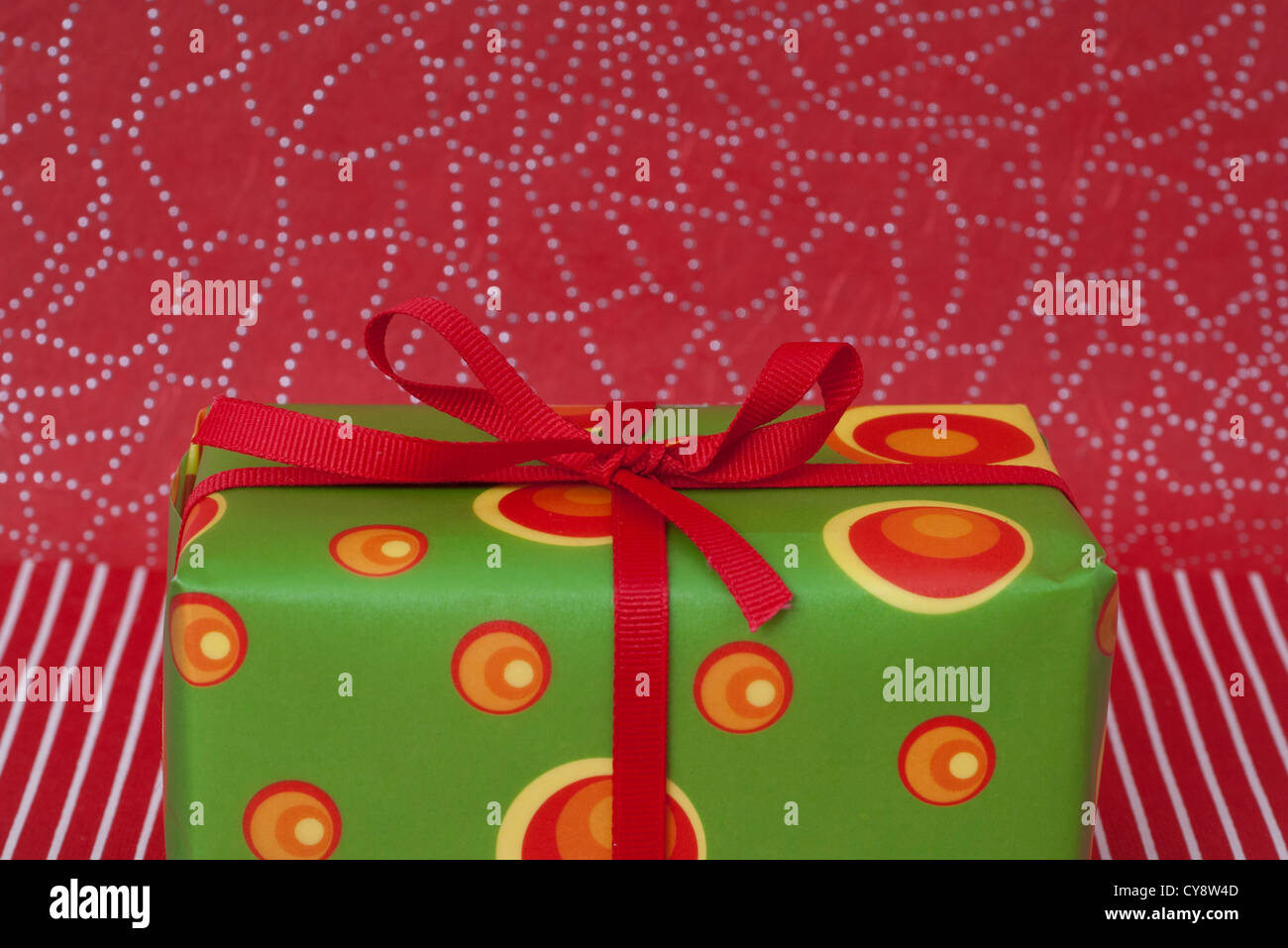 Festively wrapped Christmas present Stock Photo - Alamy
