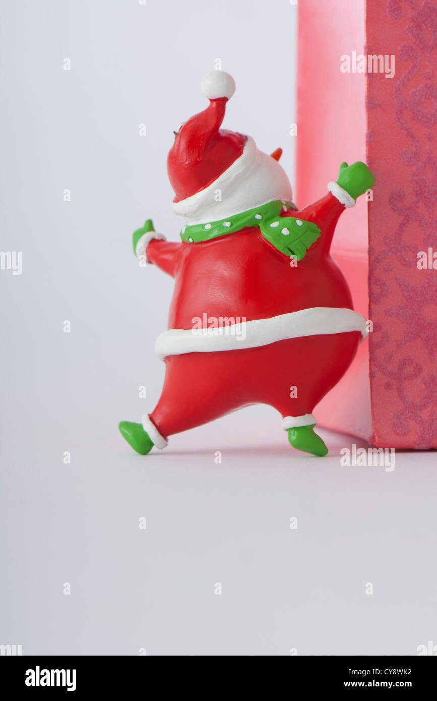 Santa Claus figurine, rear view Stock Photo - Alamy
