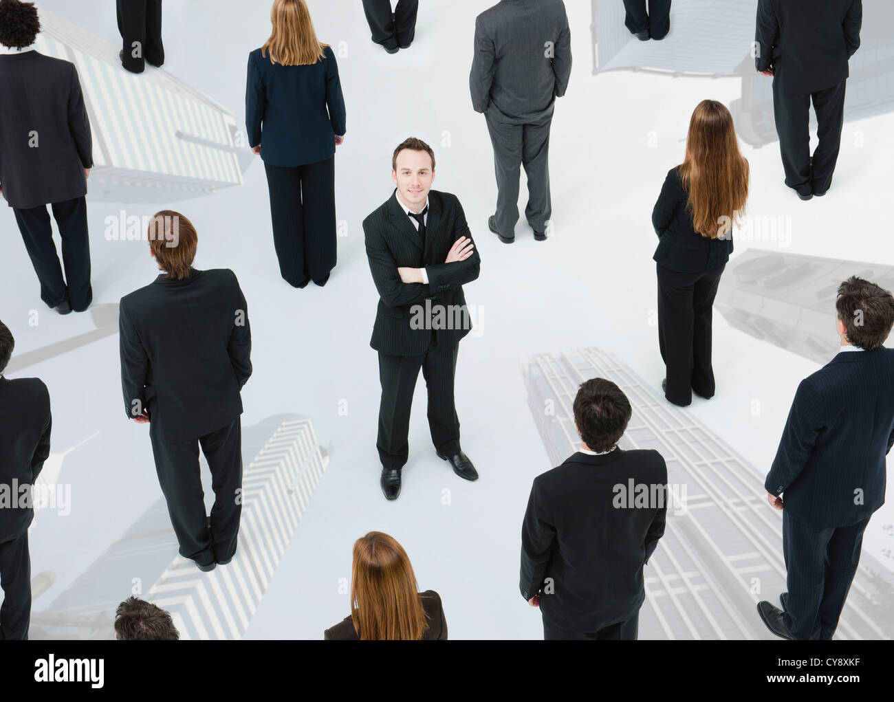 Man standing out from crowd hi-res stock photography and images - Alamy