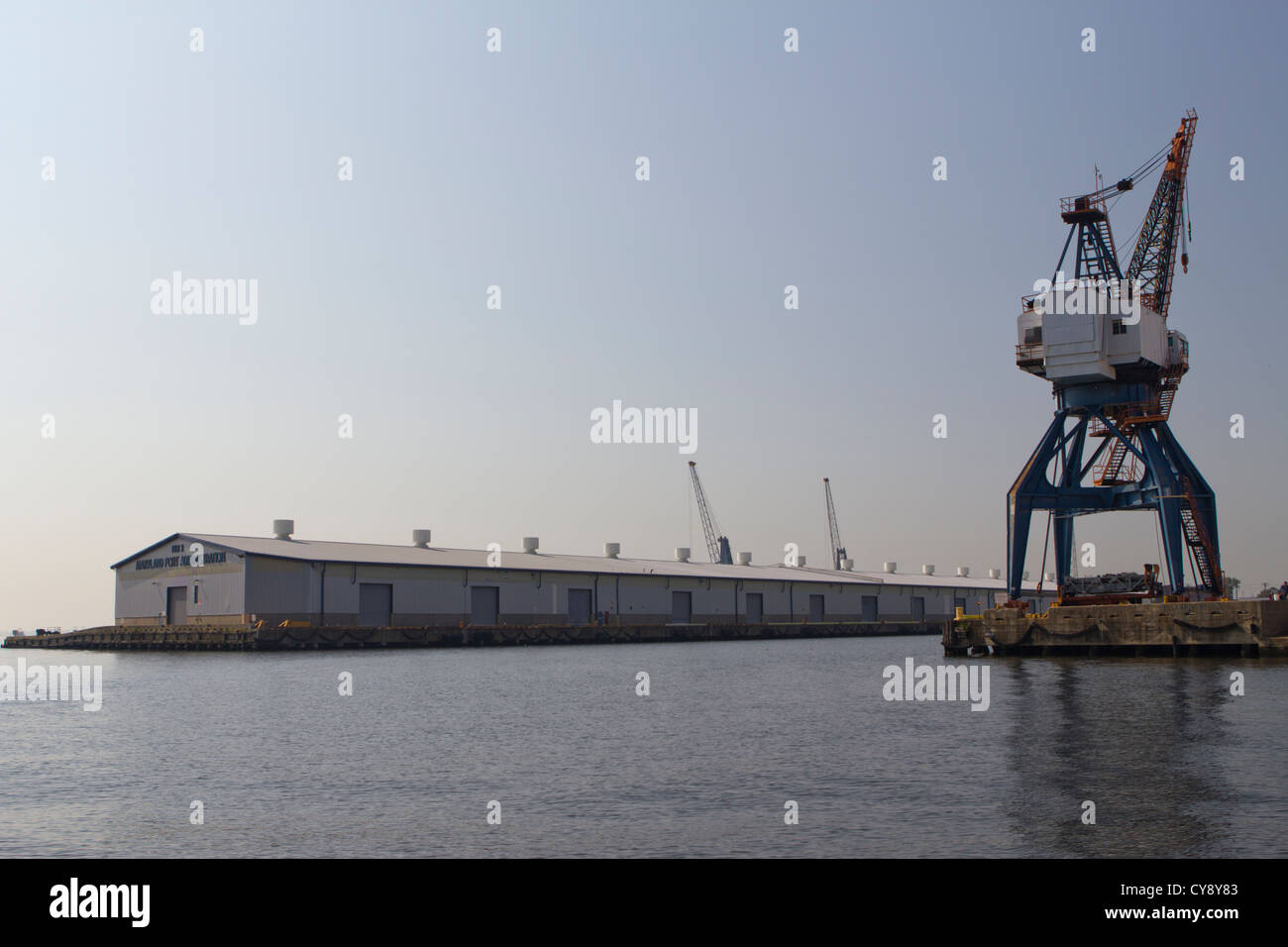 Crane at a commercial pier Baltimore, Maryland, USA Stock Photo - Alamy