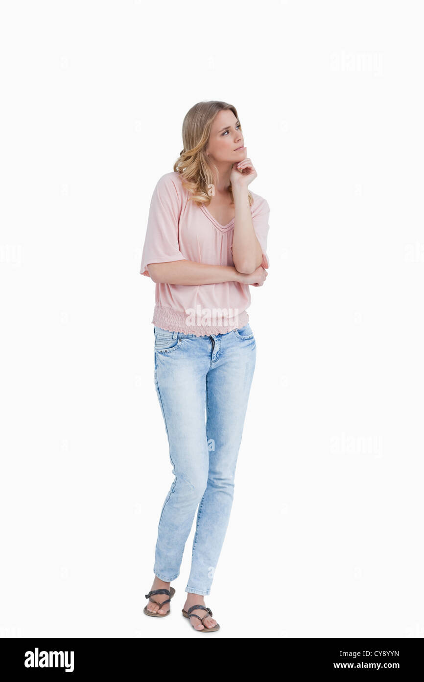 Thoughtful young woman looking away Stock Photo - Alamy