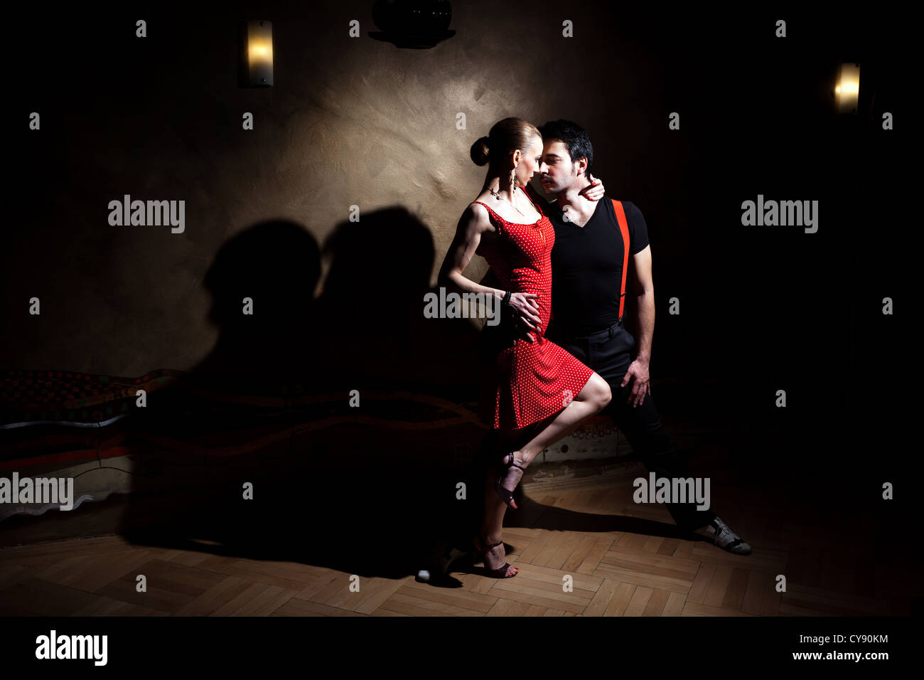 A man and a woman in the most romantic dance: tango. Please see more ...
