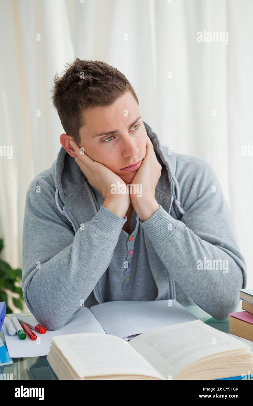 Tired cute student Stock Photo - Alamy