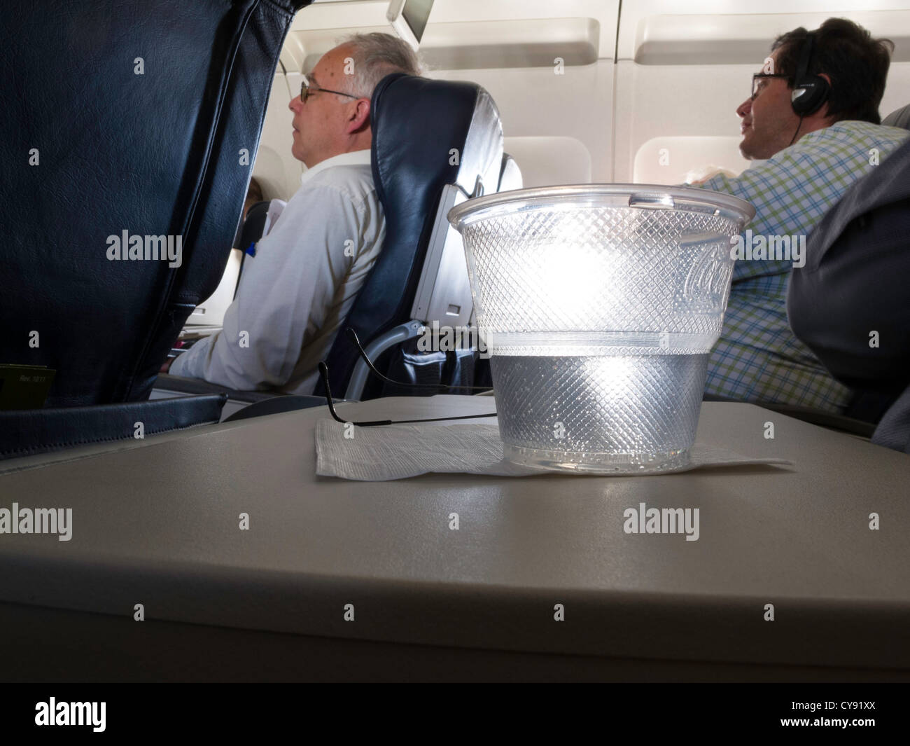 Plastic cup filled water airplane hi-res stock photography and images ...