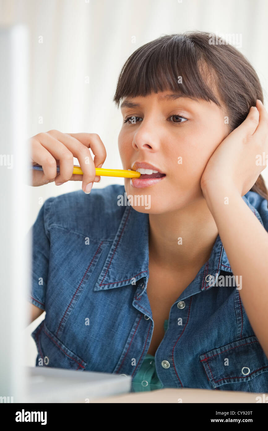 Chewing pencil hi-res stock photography and images - Alamy