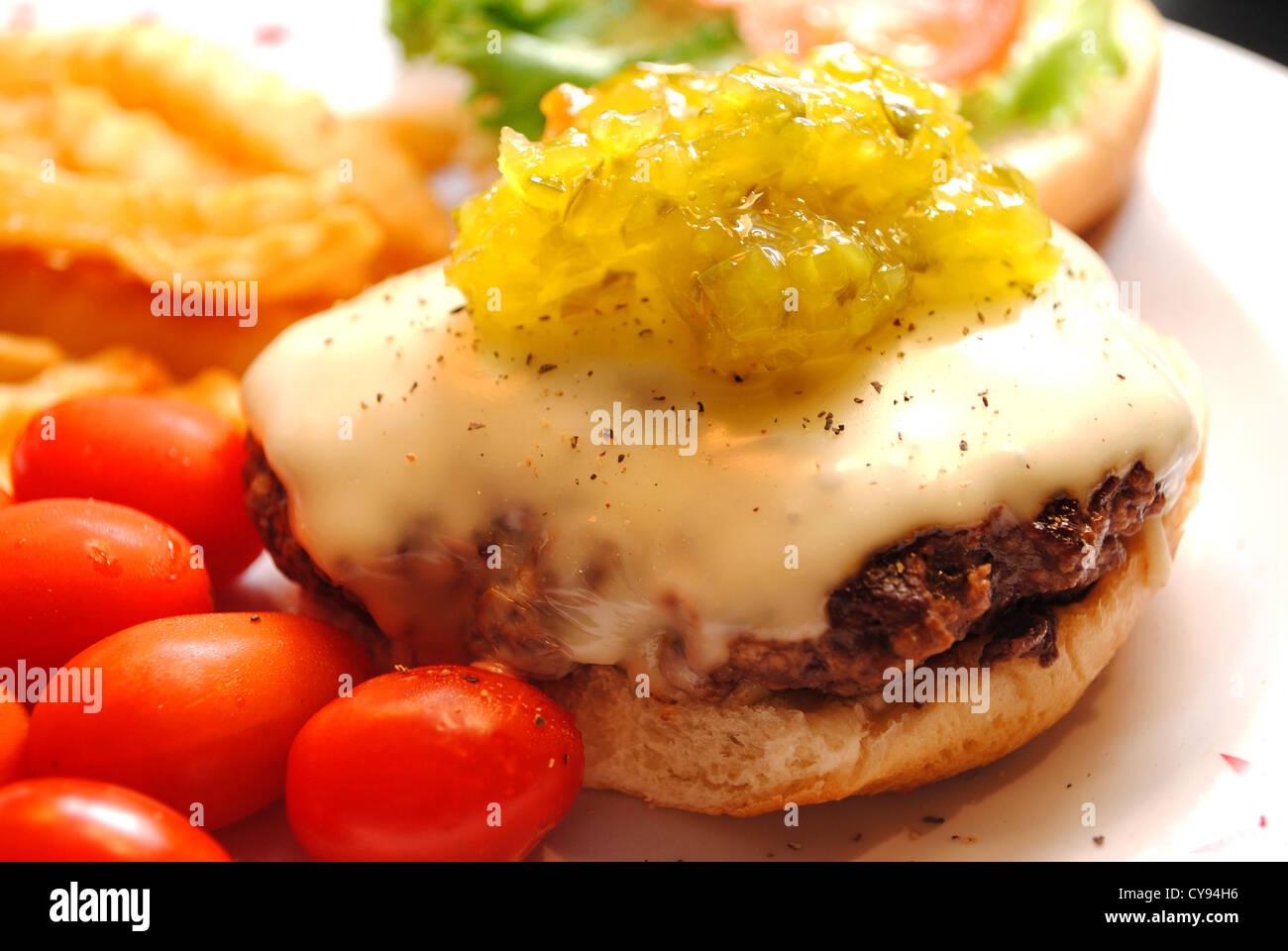 Juicy Cheeseburger with Relish Stock Photo - Alamy