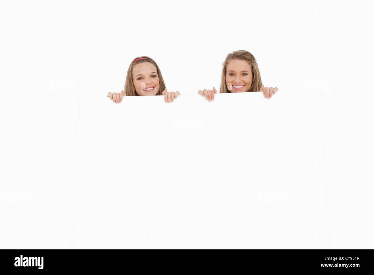 Standing behind sign hi-res stock photography and images - Alamy