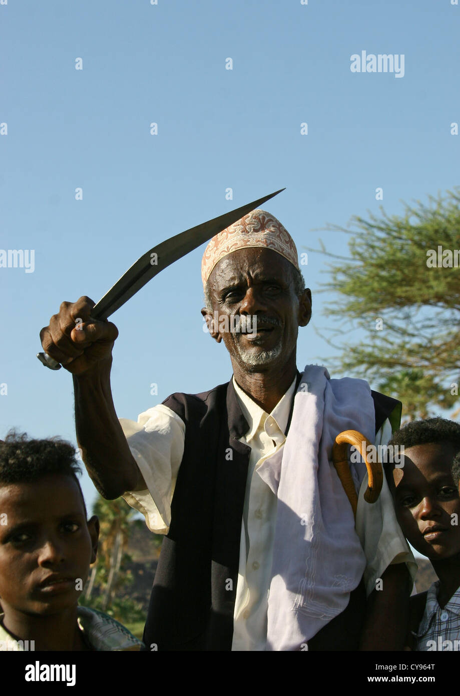 Afar Man With Big Knife During A Wedding, Danakil Coast, Eritrea Stock ...
