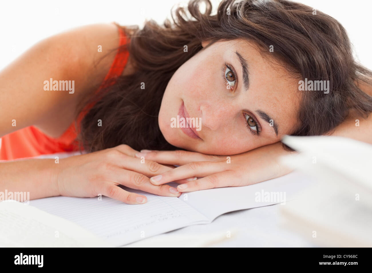 Portrait of a beautiful student head on her homeworks Stock Photo - Alamy