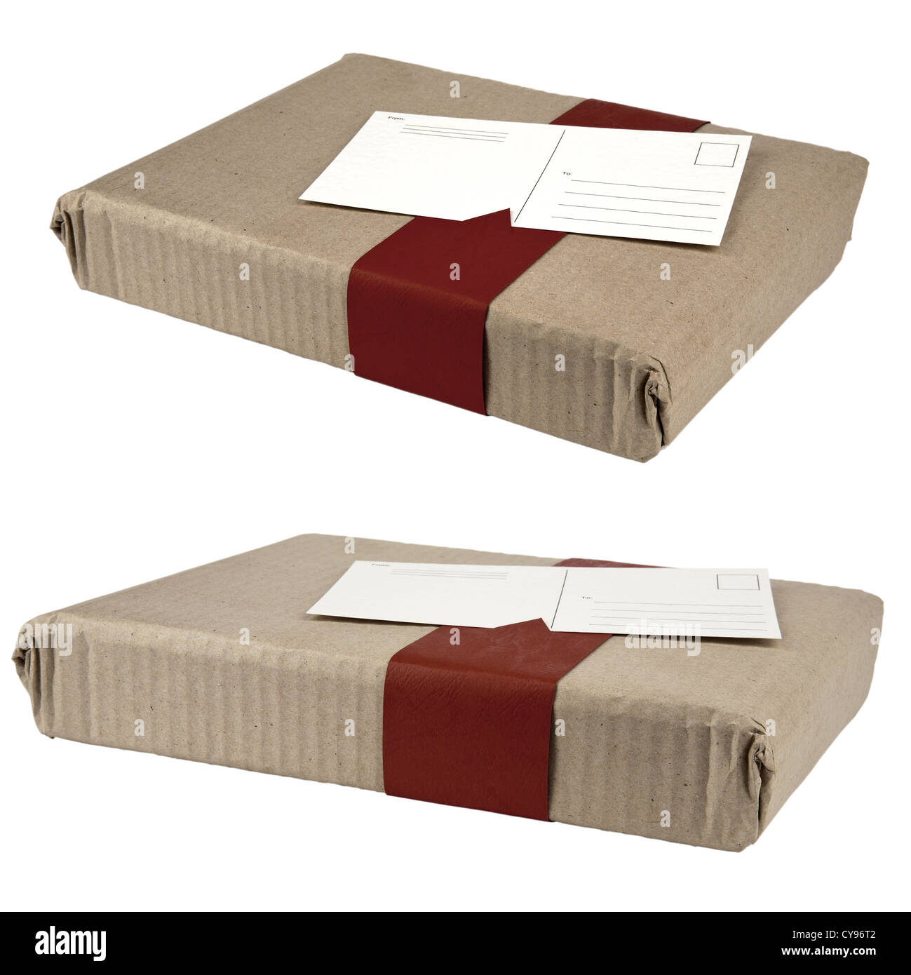 two wrapped boxes and attached postcard Stock Photo - Alamy