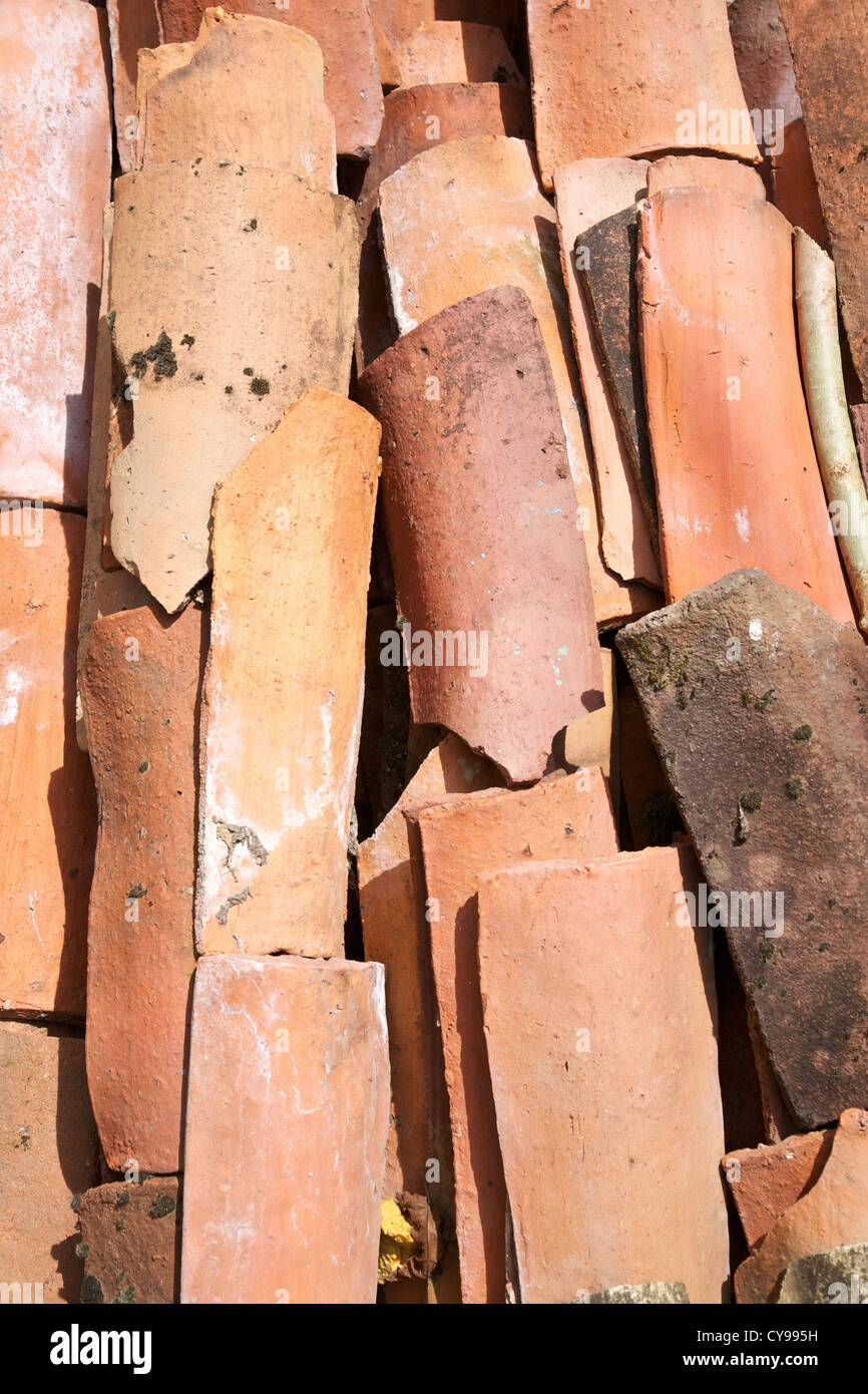 big group of orange tiles stacked on a great pile Stock Photo - Alamy