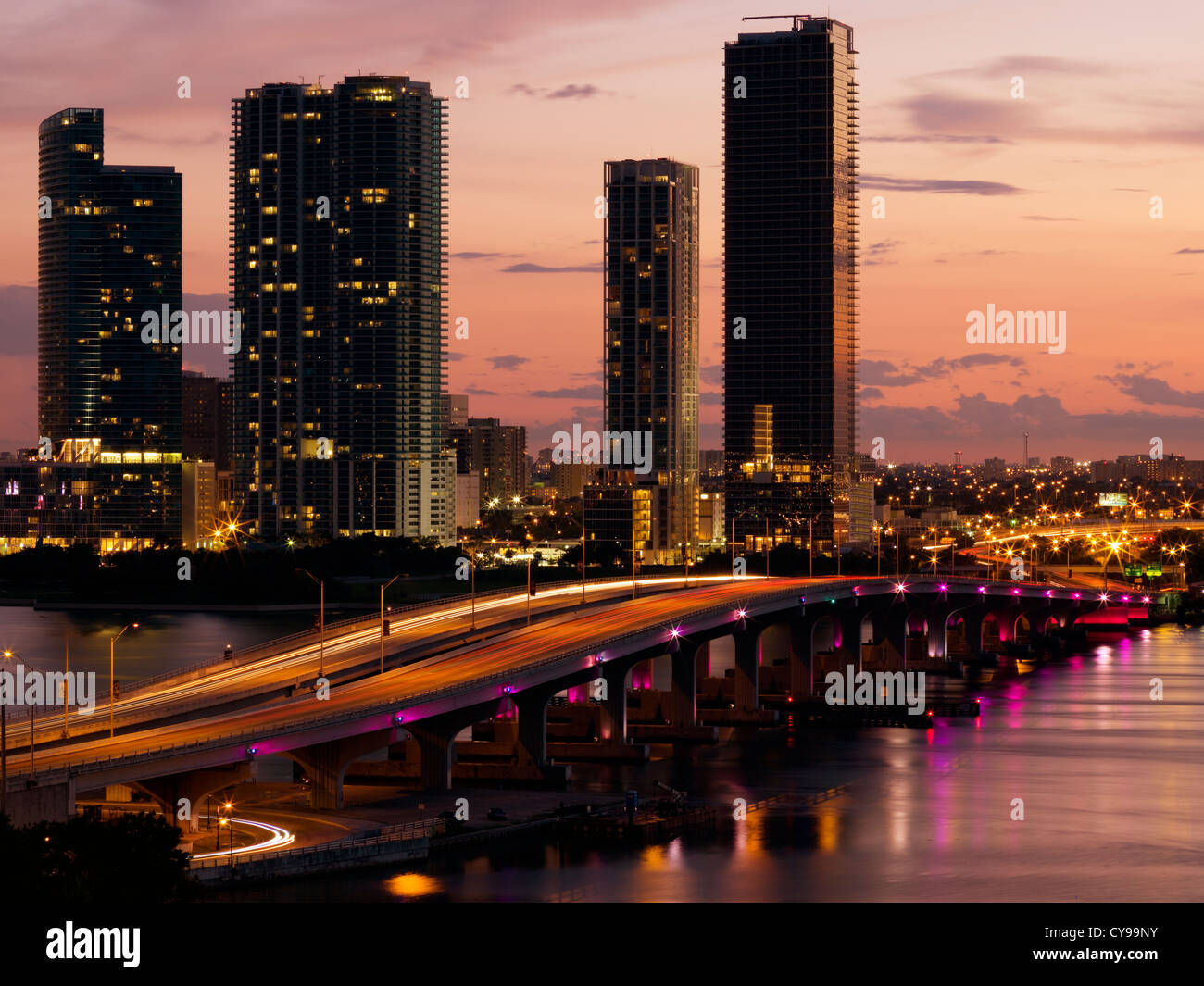 Downtown Miami Skyline, Skyscrapers and Mac Arthur causeway, night dusk ...