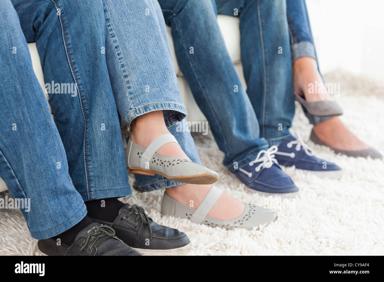 Side view of people's feet Stock Photo - Alamy
