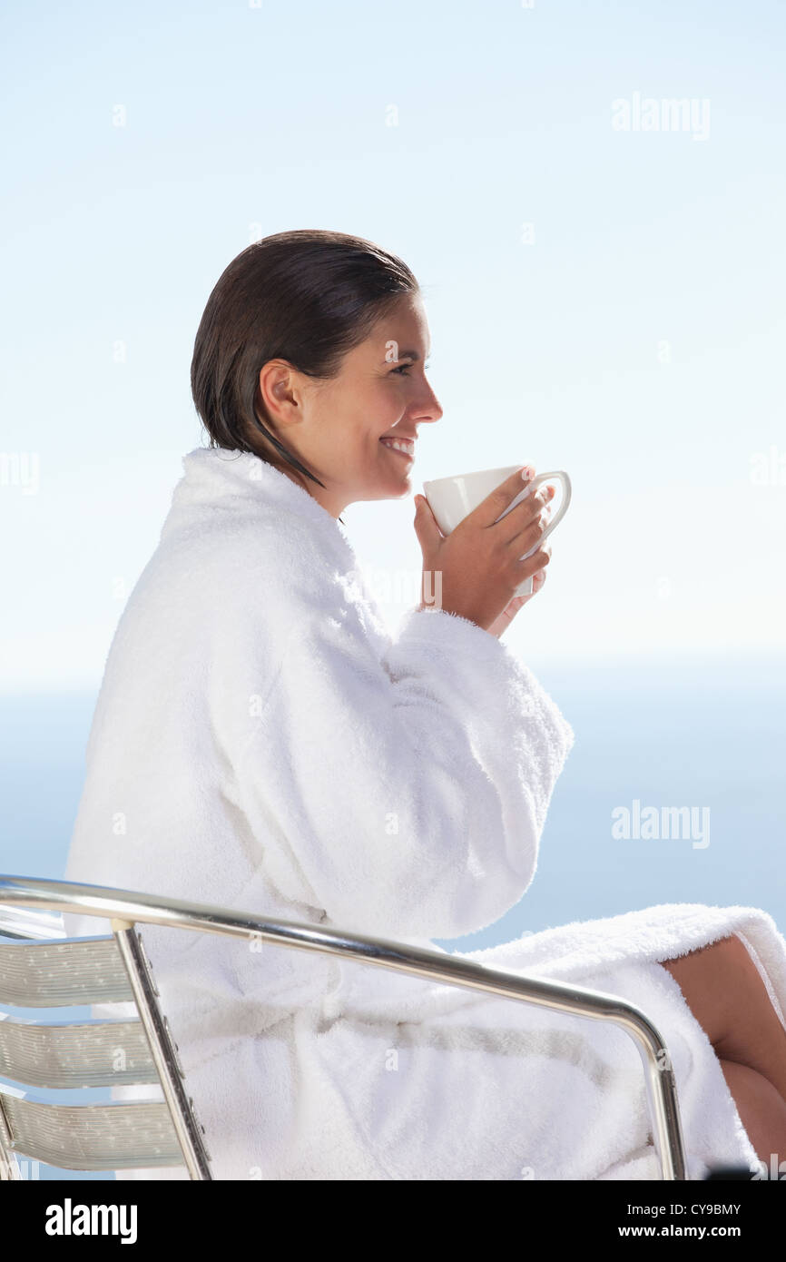 Woman bathing in coffee cup hi-res stock photography and images - Alamy
