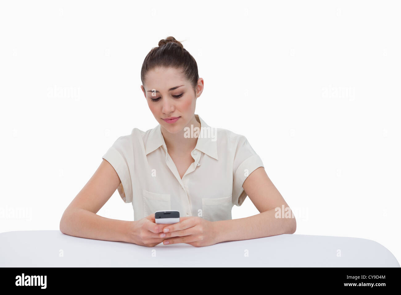 Businesswoman writing a text message Stock Photo - Alamy