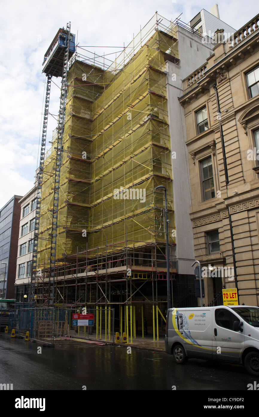 Scaffolding erected on front of a large commercial building in Leeds ...