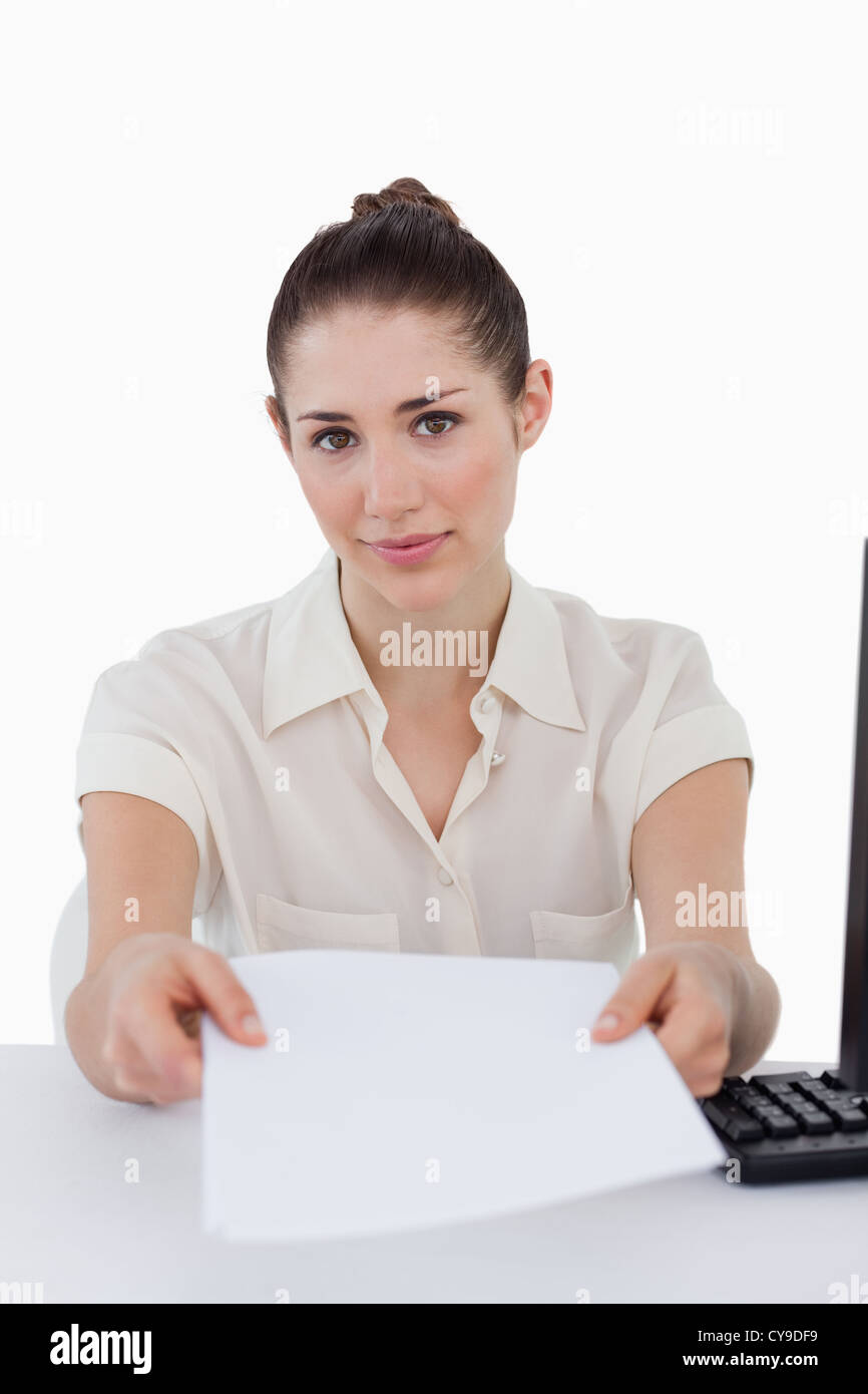 Portrait of a businesswoman giving a document Stock Photo - Alamy