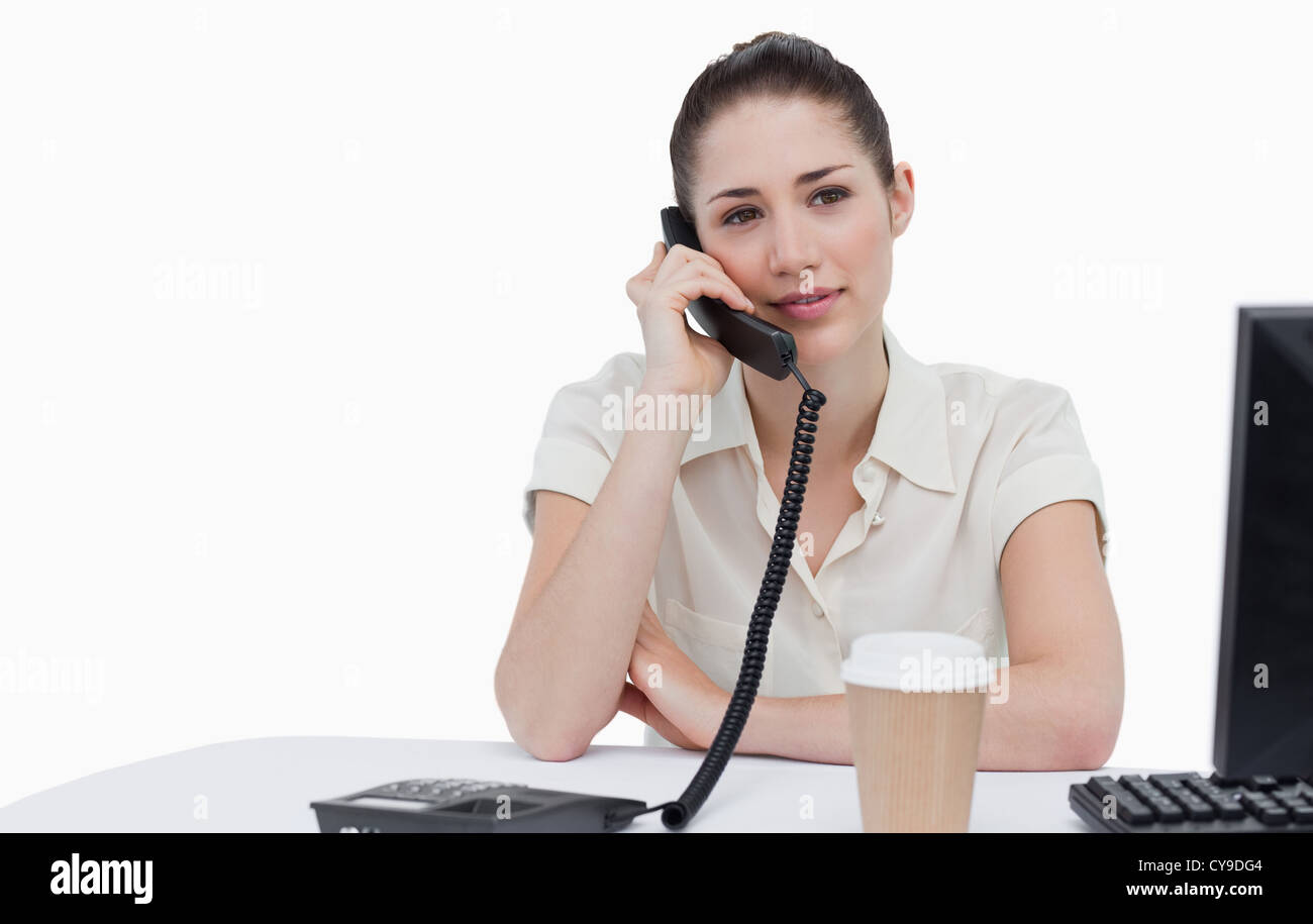 Secretary answering the phone Stock Photo - Alamy