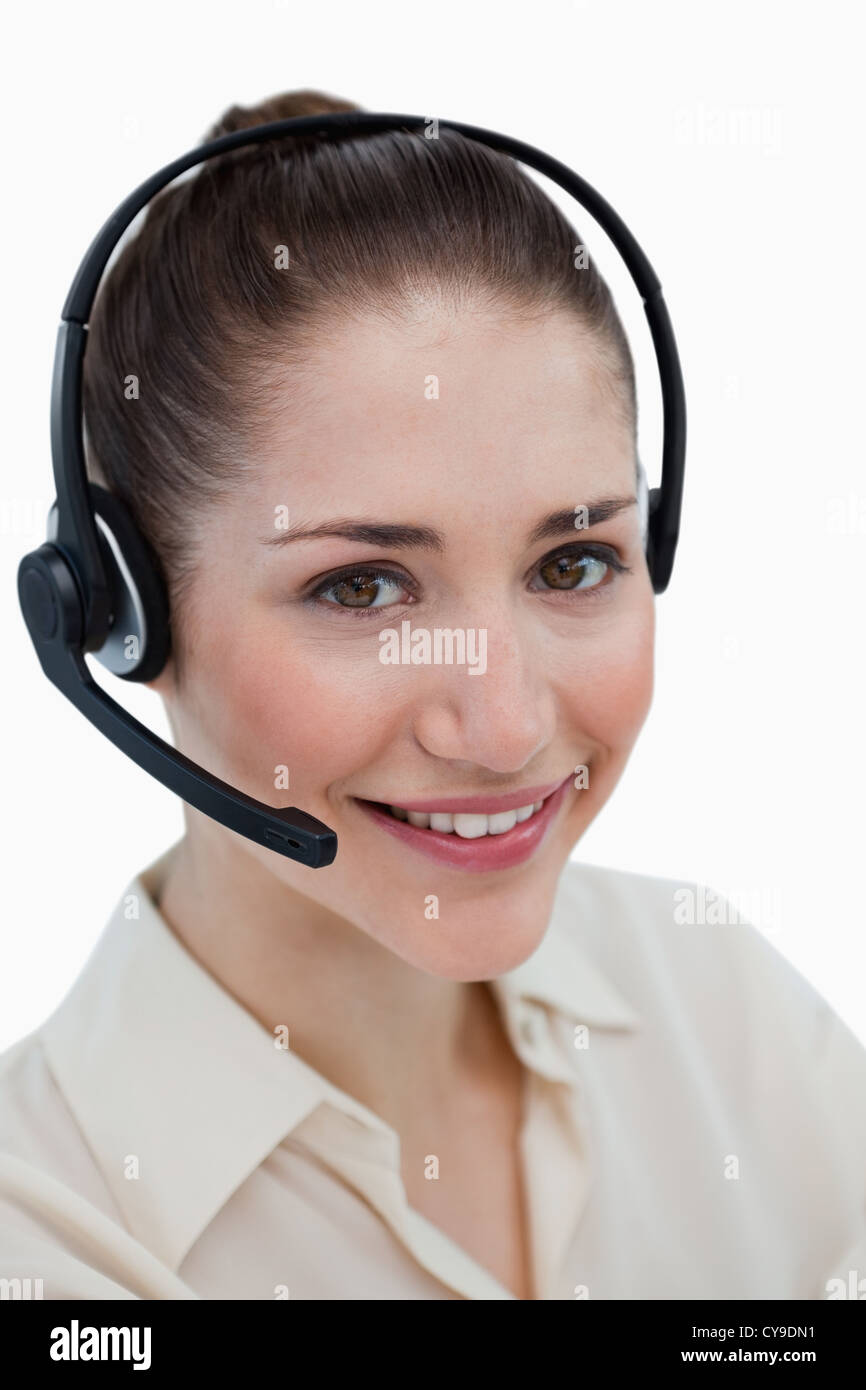 Portrait of a happy operator posing with a headset Stock Photo - Alamy